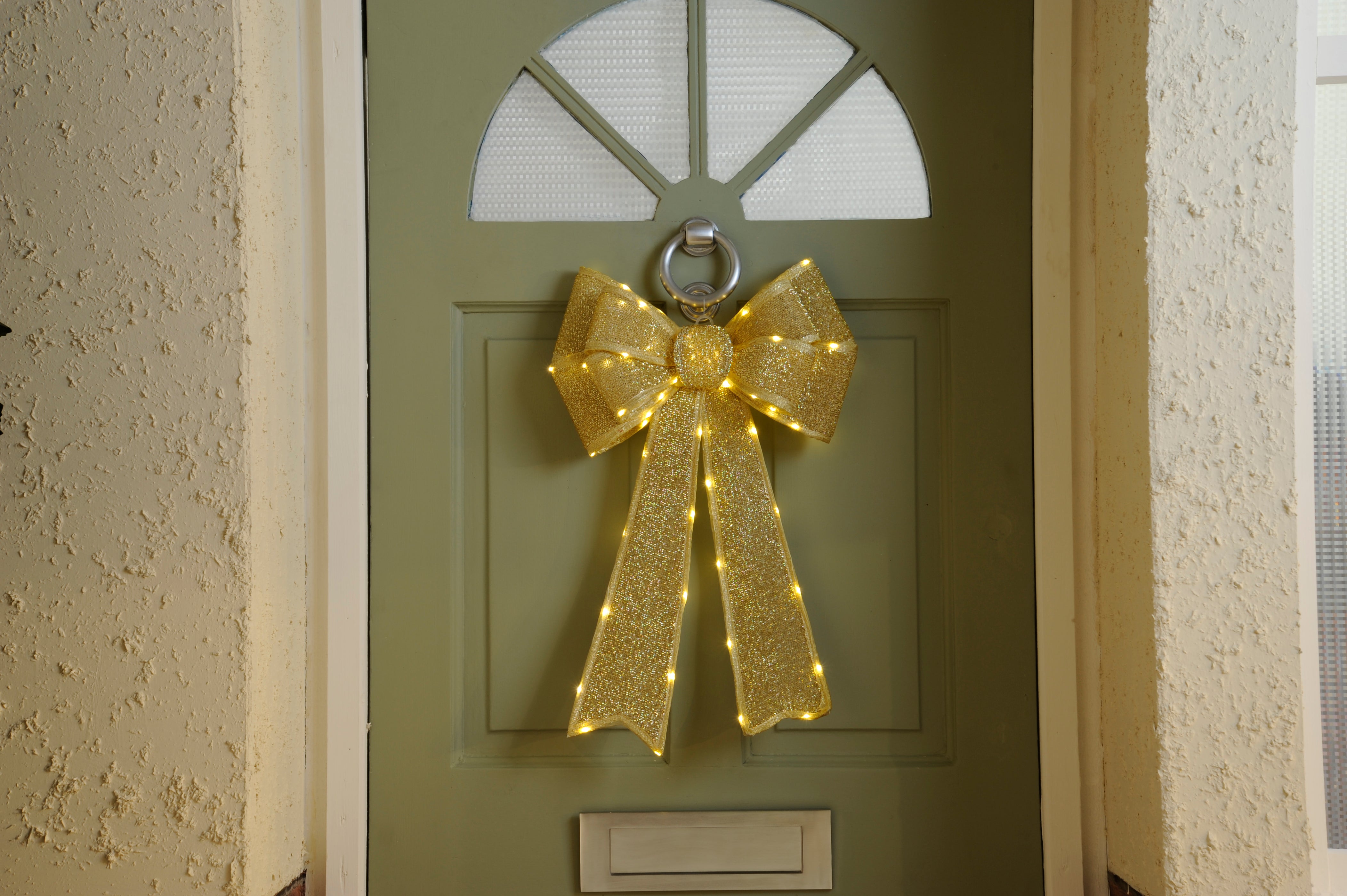 Lit Gold Bow Decoration | Pines and Needles